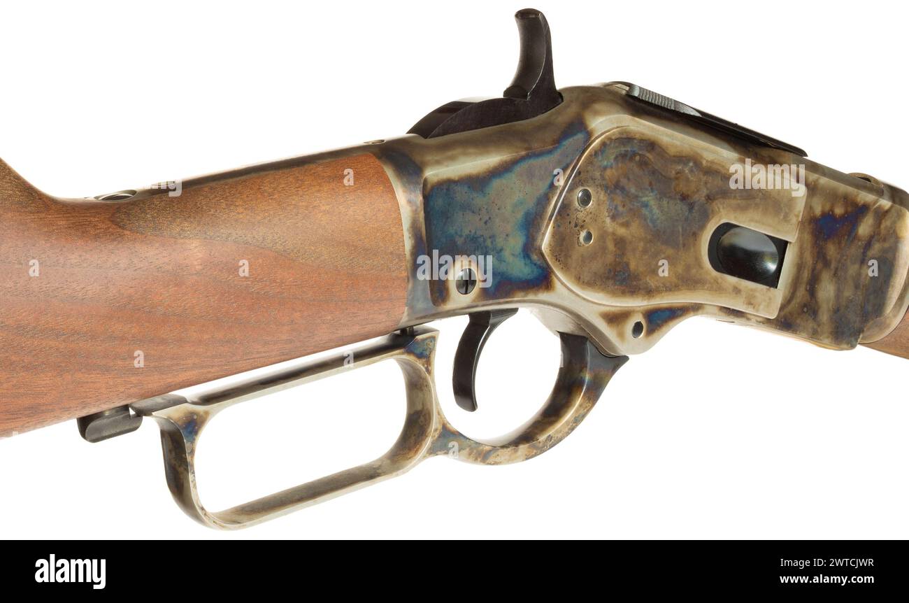 Isolated lever and receiver on a lever action rifle that are color ...