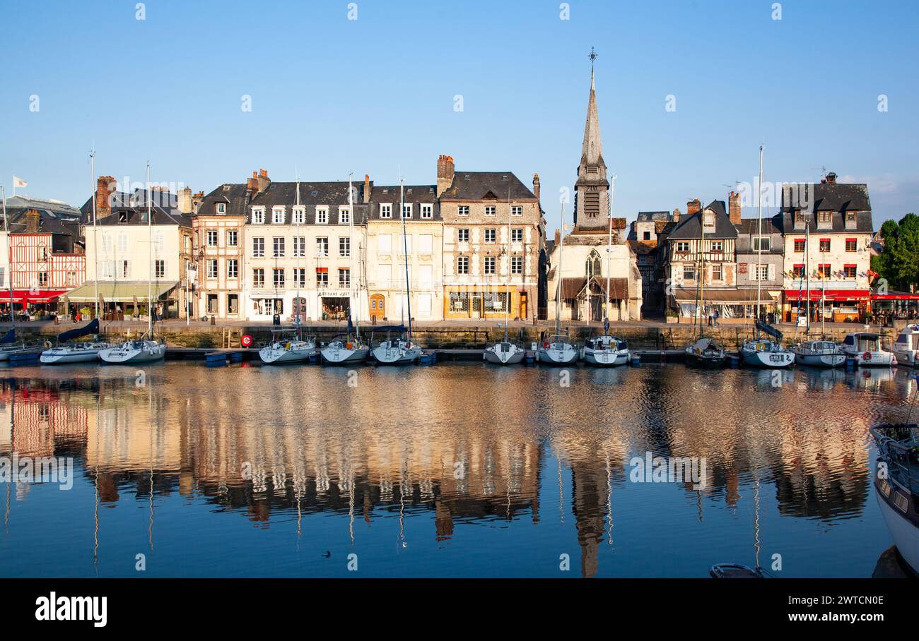 HONFLEUR, FRANCE - MAY4, 2018:Waterfront reflection of traditional ...