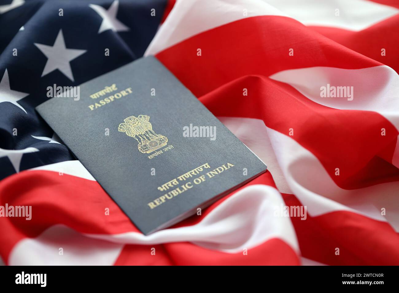Blue Indian Passport On United States National Flag Background Close Up 0390