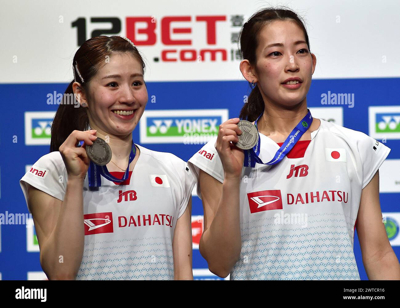 Japan's Nami Matsuyama and Chiharu Shida, left, pose second place ...