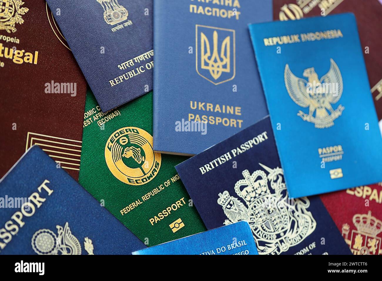 Many Various Passports Of Citizens Of Different Countries And Regions