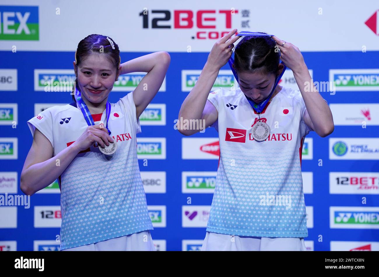 Japan's Nami Matsuyama and Chiharu Shida with their runners up medals following defeat against ...