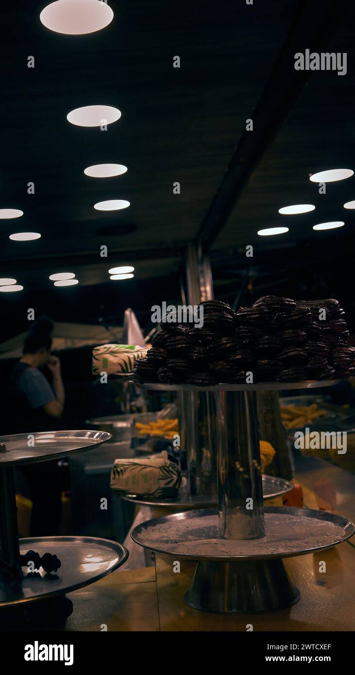 Chocolate donuts at Hollowing in Lloret de Mar, Spain. Street food ...