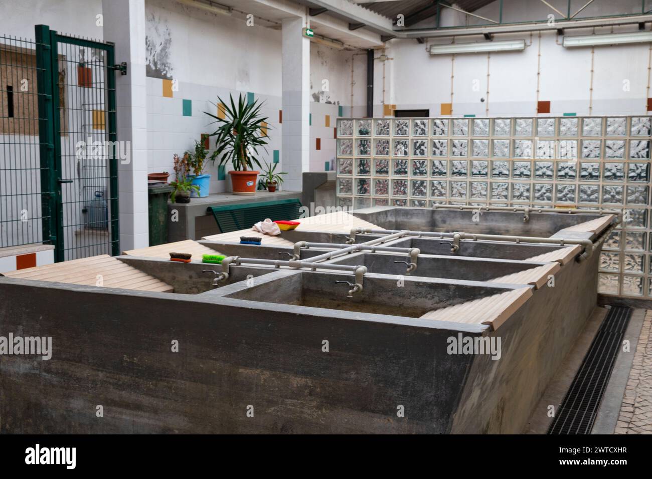Traditional old communal laundry in Lisbon Stock Photo - Alamy