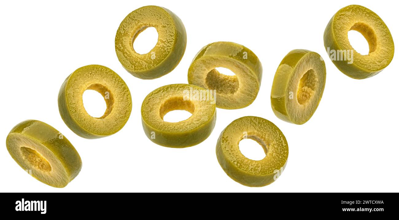 Falling green olive slices isolated on white background Stock Photo - Alamy
