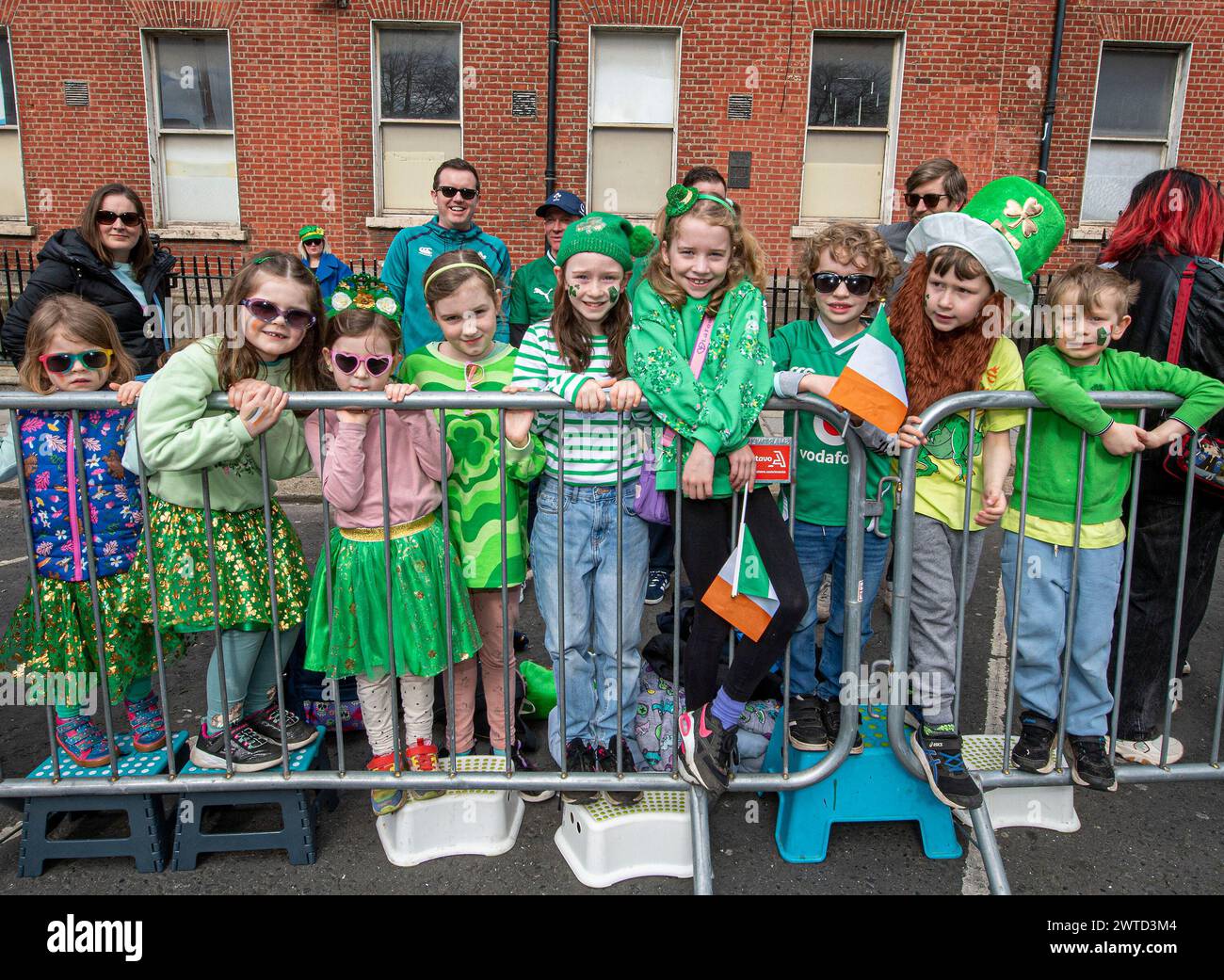 Children from Dromcondra wait for the St Patrick's Day Parade in Dublin ...