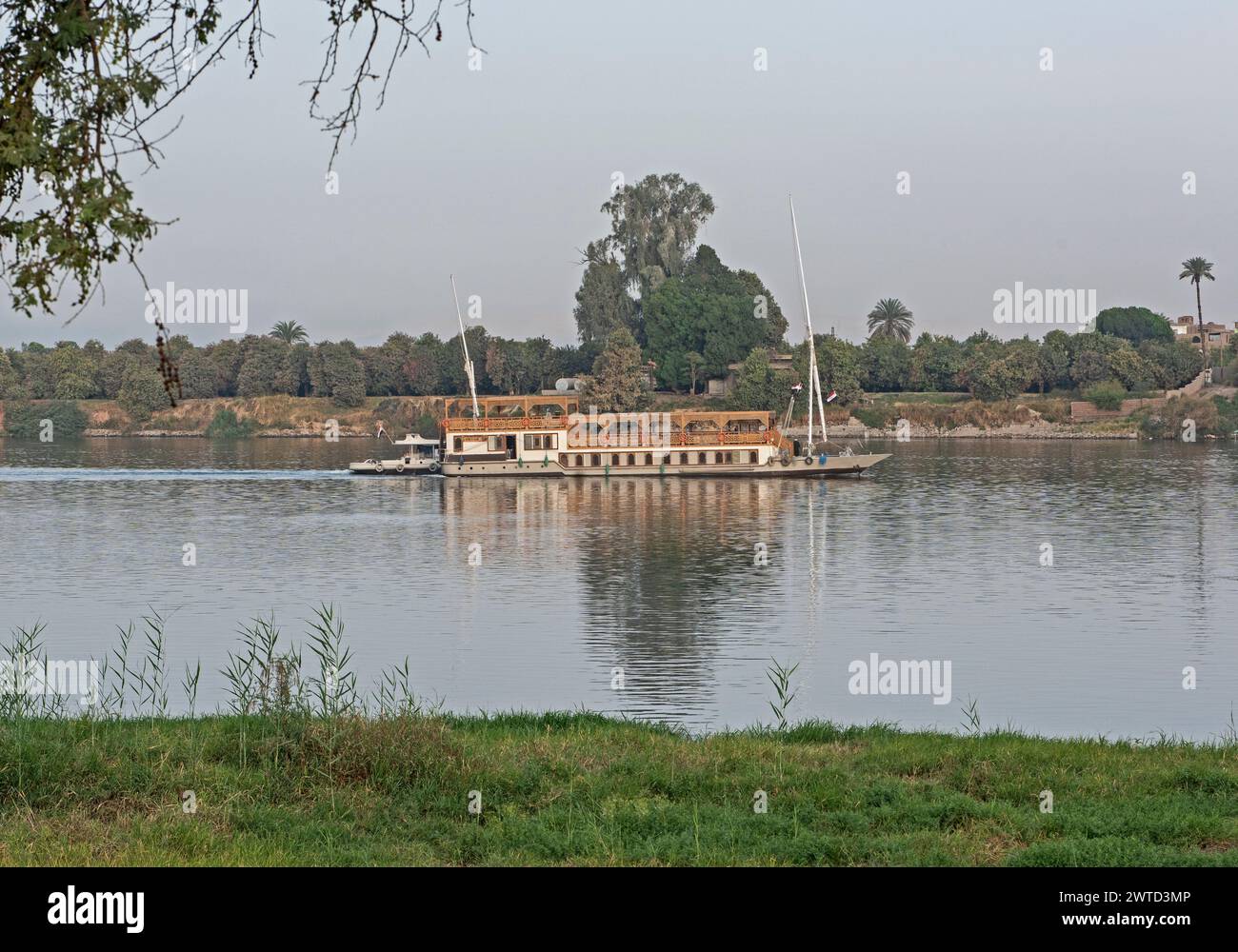 Large luxury traditional Egyptian dahabeya river cruise boat sailing on ...