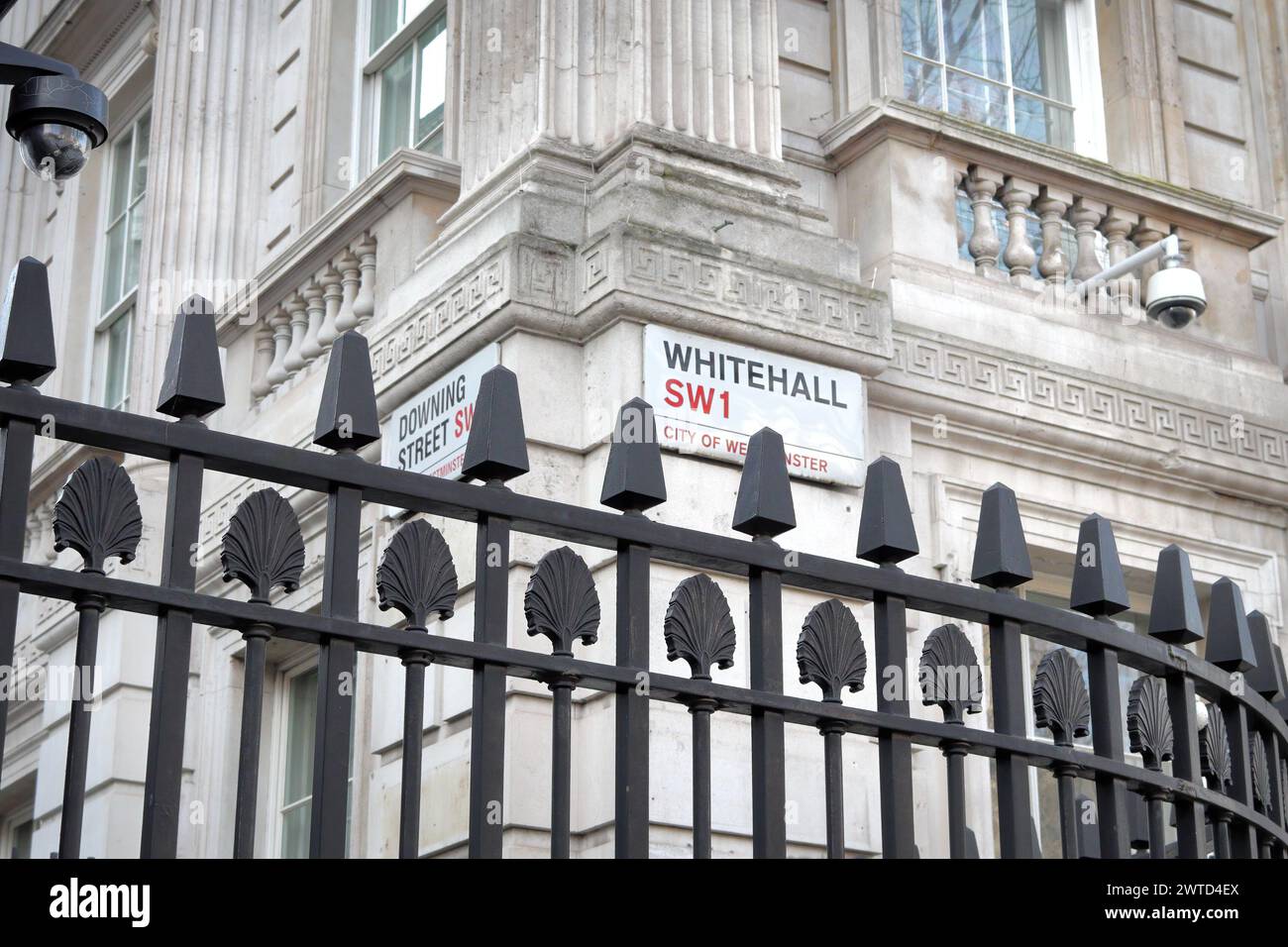 Street name signs at the junction of Downing Street and Whitehall in ...