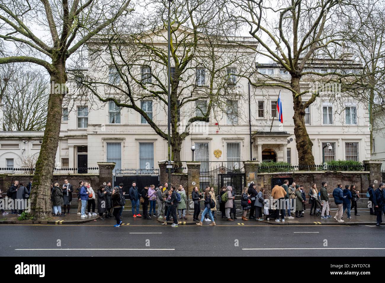 London, UK. 17 March 2024. People in the voting queue outside the ...