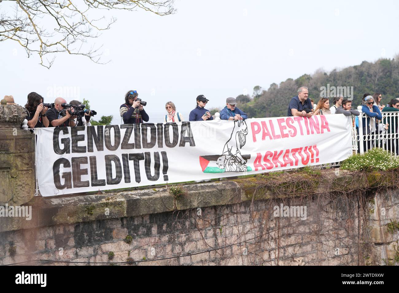 People photograph a demonstration in support of Palestine on March 17 ...