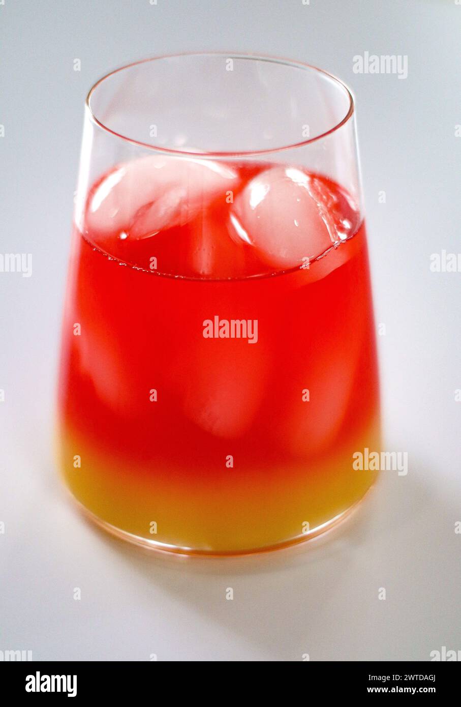Red cocktail ice cubes hi-res stock photography and images - Alamy
