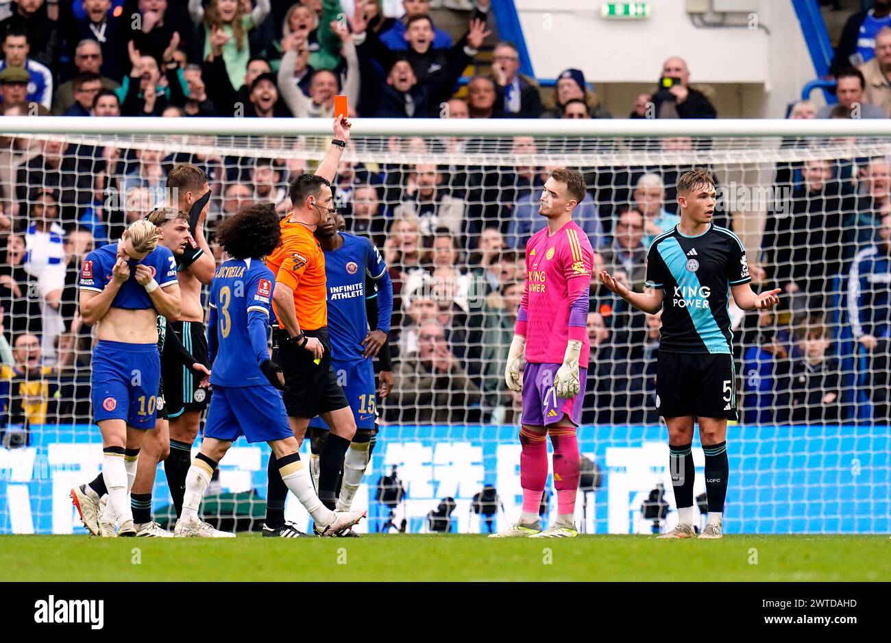 Leicester City's Callum Doyle is shown a red card by referee Andrew Madley after a VAR check ...