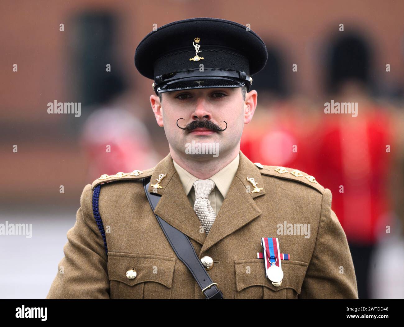 Aldershot, UK. March 17th, 2024. Irish Guardsmen, wearing a sprig of ...