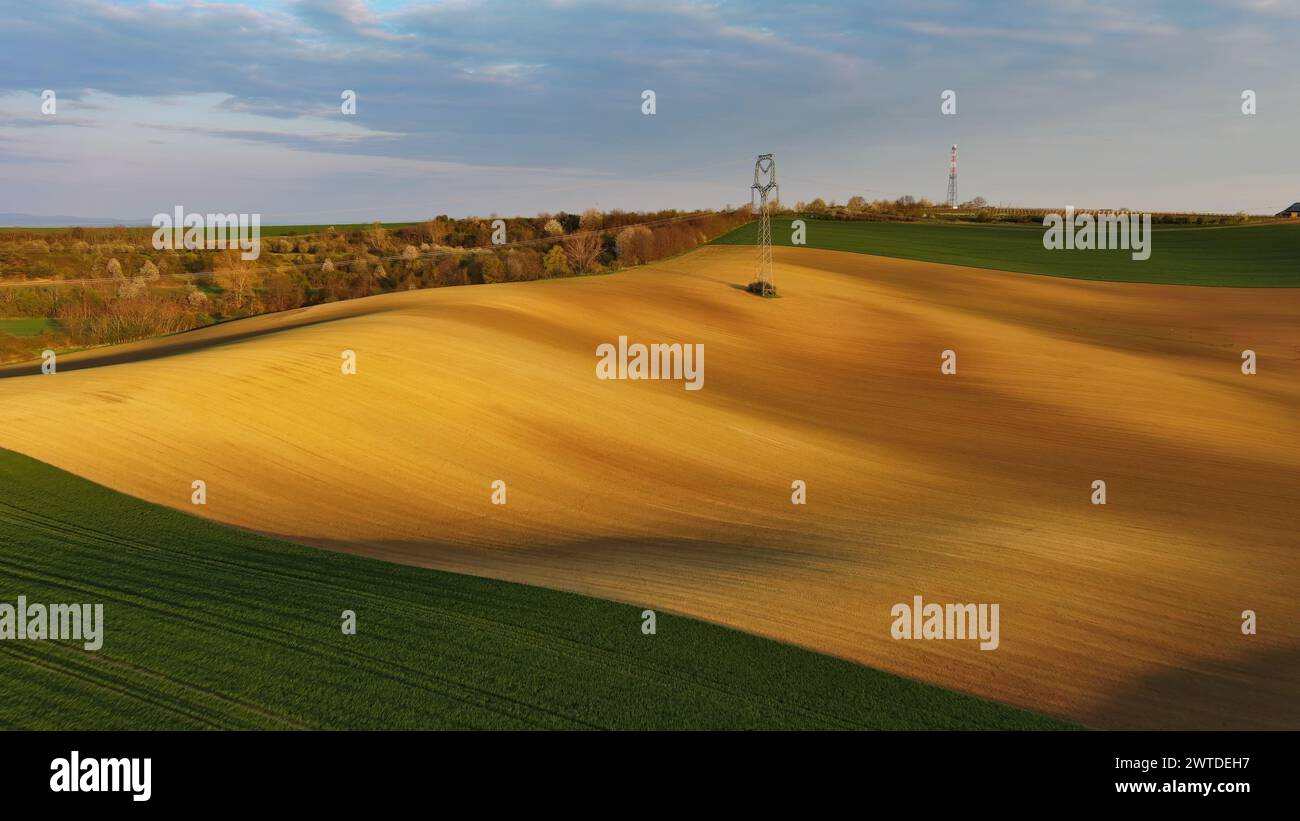 Green wavy hills with agricultural fields Stock Photo - Alamy