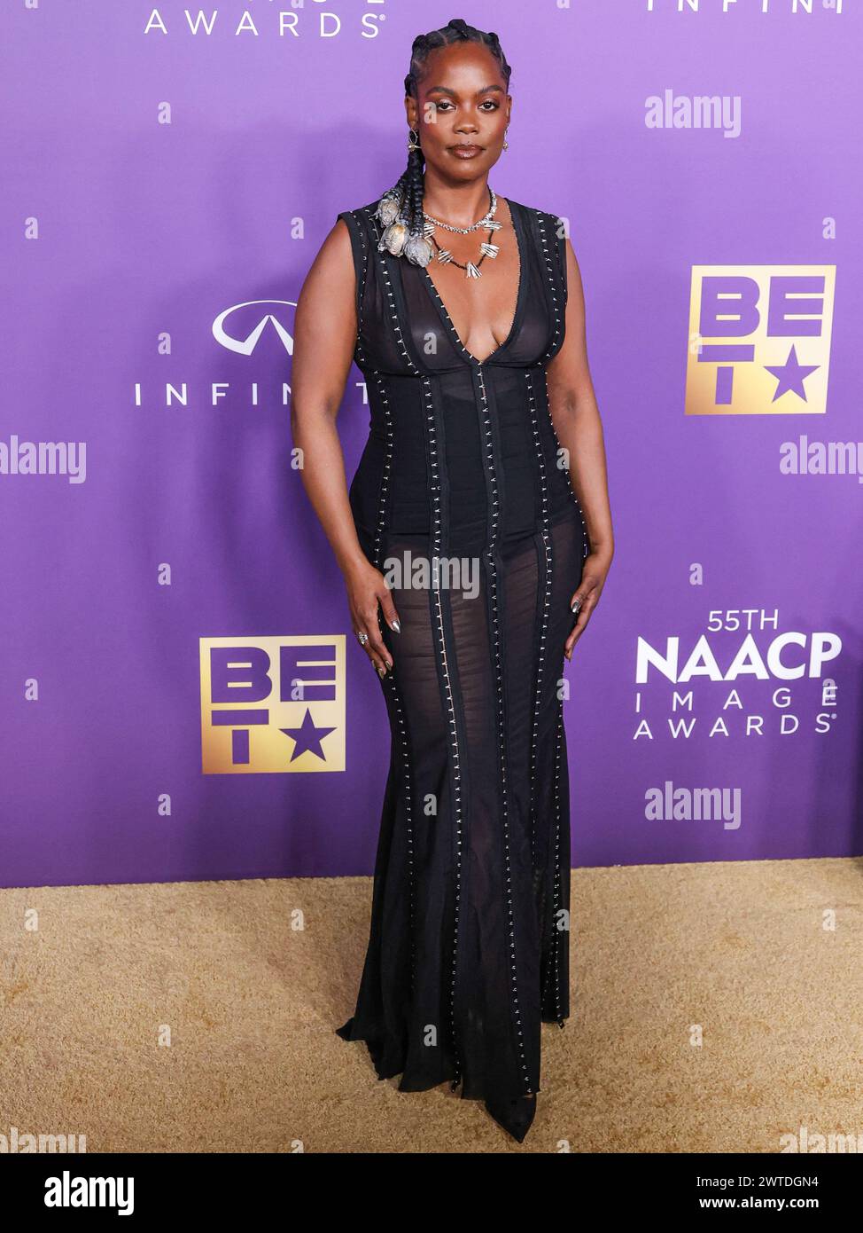 LOS ANGELES, CALIFORNIA, USA - MARCH 16: Novi Brown arrives at the 55th ...