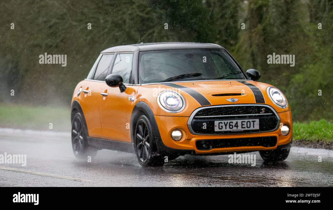 Milton Keynes,UK-Mar 17th 2024: 2014 orange diesel engine Mini Cooper S ...