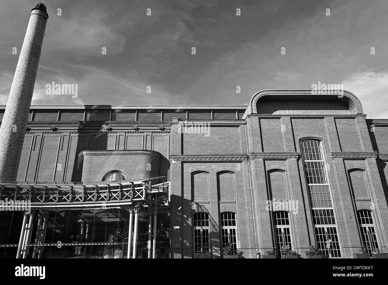 Chimney and building of renovated old brewery in the city of Poznan ...