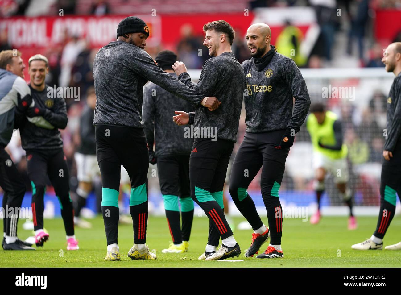 Manchester United's Sofyan Amrabat (right) and Manchester United's Mason Mount warm up ahead of ...