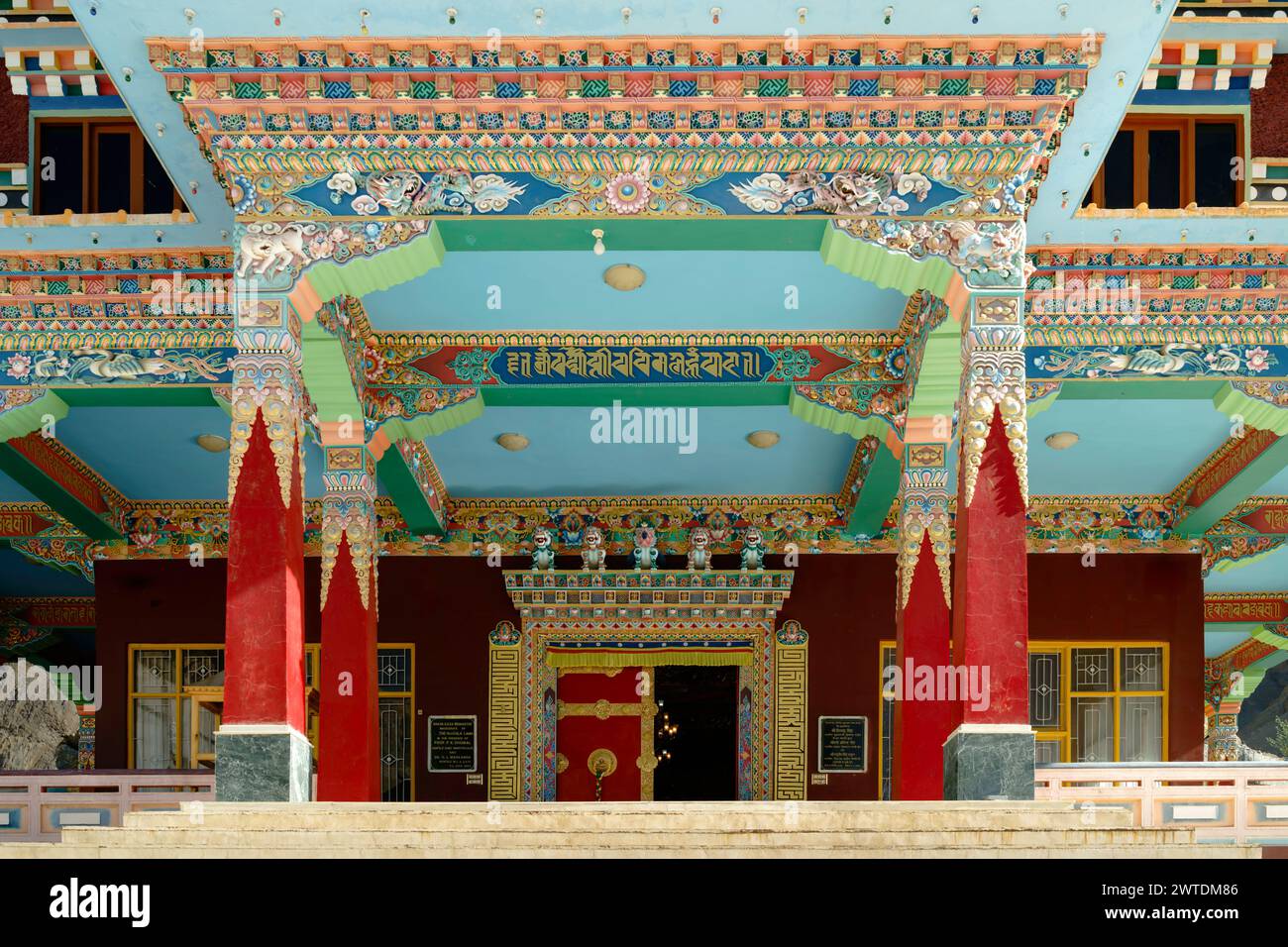 The entrance, front façade, to the beautiful Buddhist Gompa (temple ...