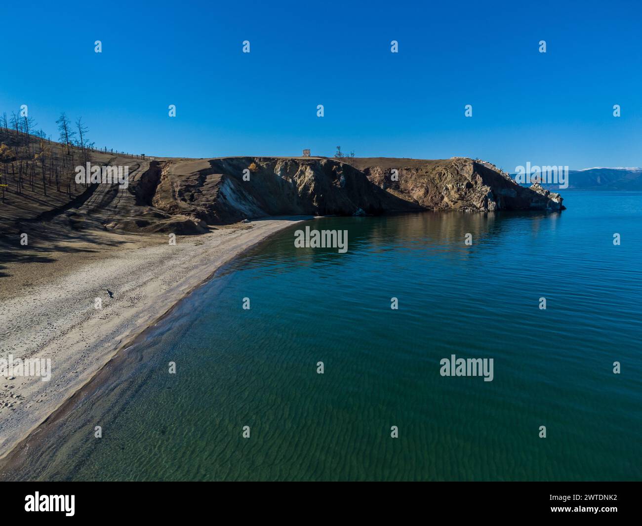Sarayskiy beach. Shamanka Rock. Lake Baikal at Olkhon Island. the ...