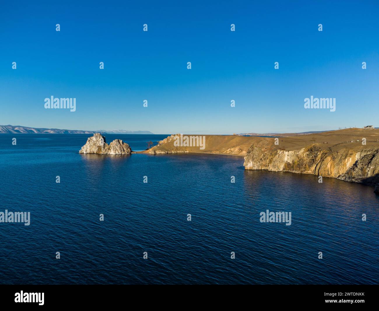 Shamanka Rock. Lake Baikal at Olkhon Island. the village of Khuzhir ...