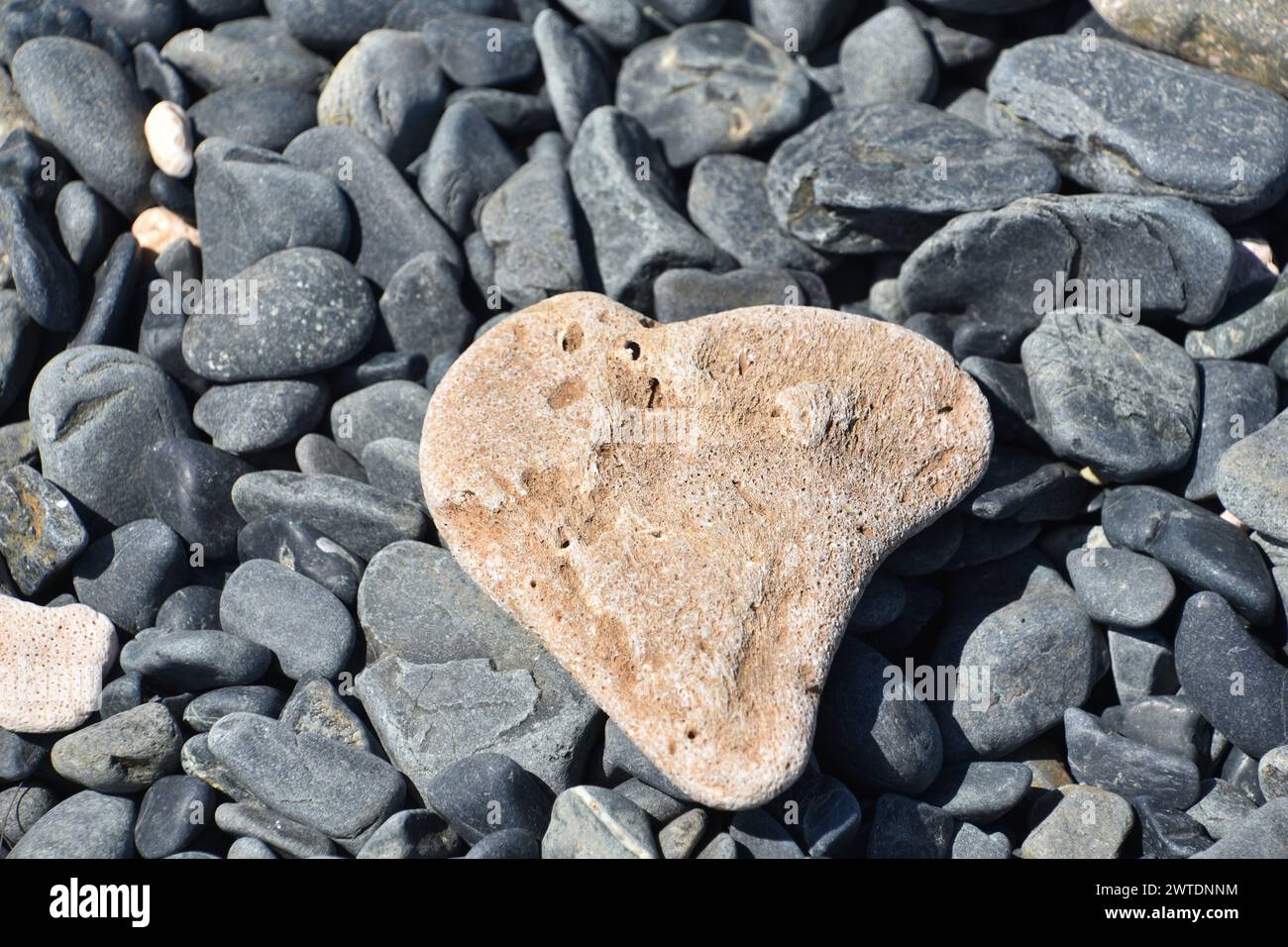 Naturally shaped heart stone hi-res stock photography and images - Alamy