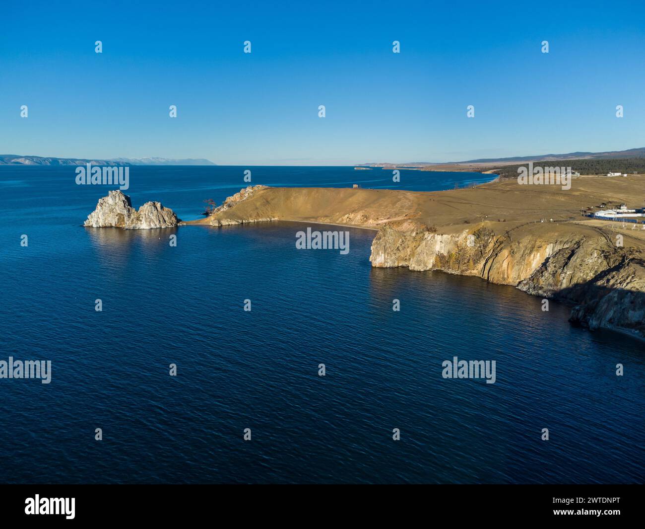 Shamanka Rock. Lake Baikal at Olkhon Island. the village of Khuzhir ...
