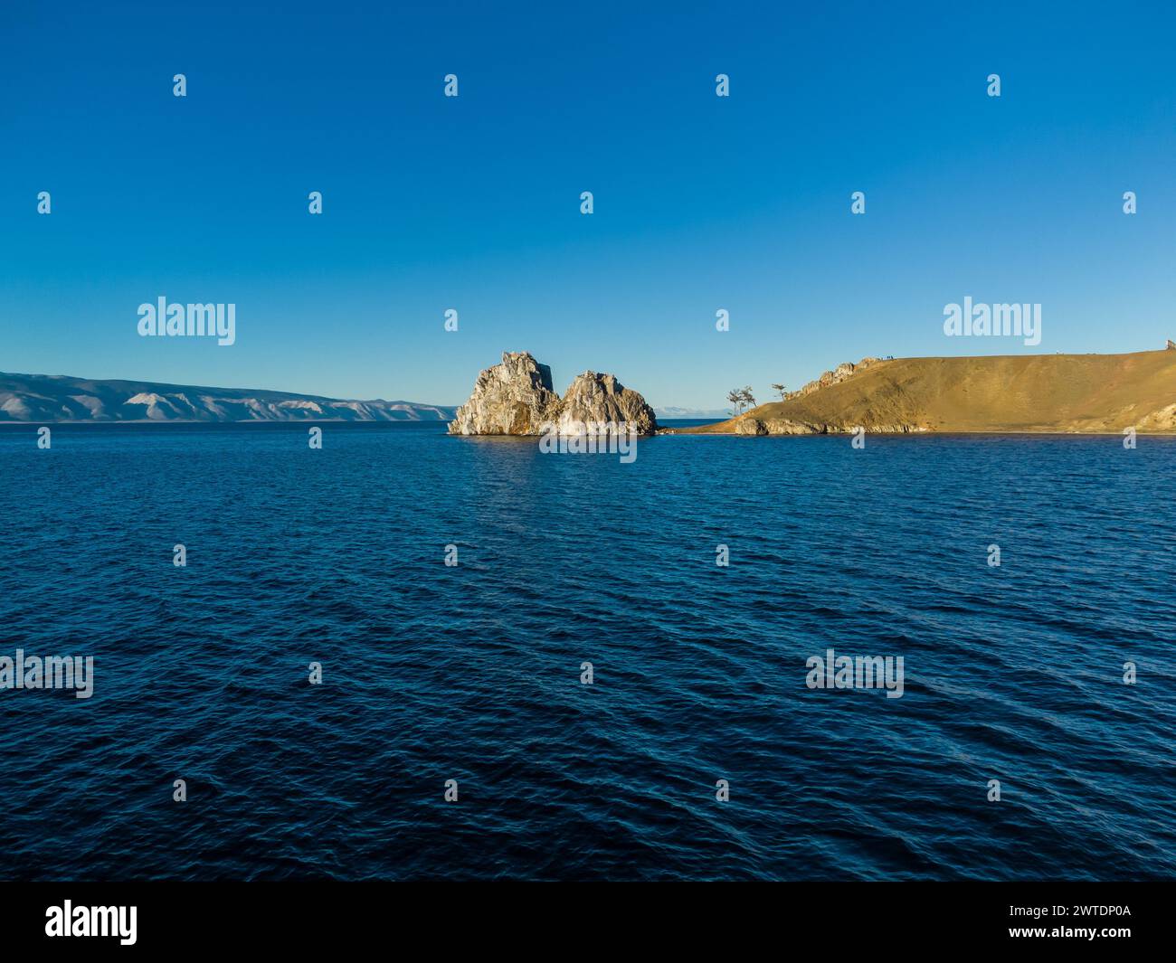 Shamanka Rock. Lake Baikal at Olkhon Island. the village of Khuzhir ...