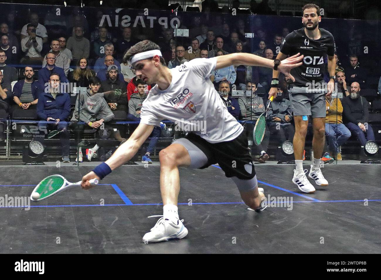 Curtis Malik (Eng) at full stretch during the Optasia Squash ...