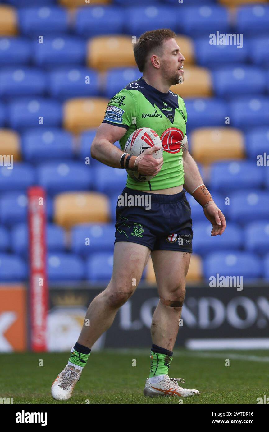 London, UK. 17th Mar, 2024. Matt Dufty of Warrington Wolves scores a ...