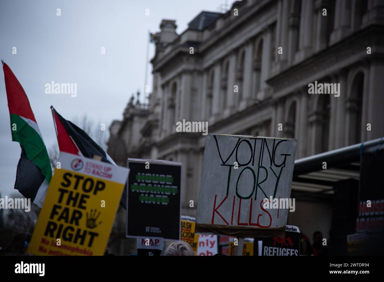 London, UK. 16th Mar, 2024. Protestors hold placards during the UN Anti ...