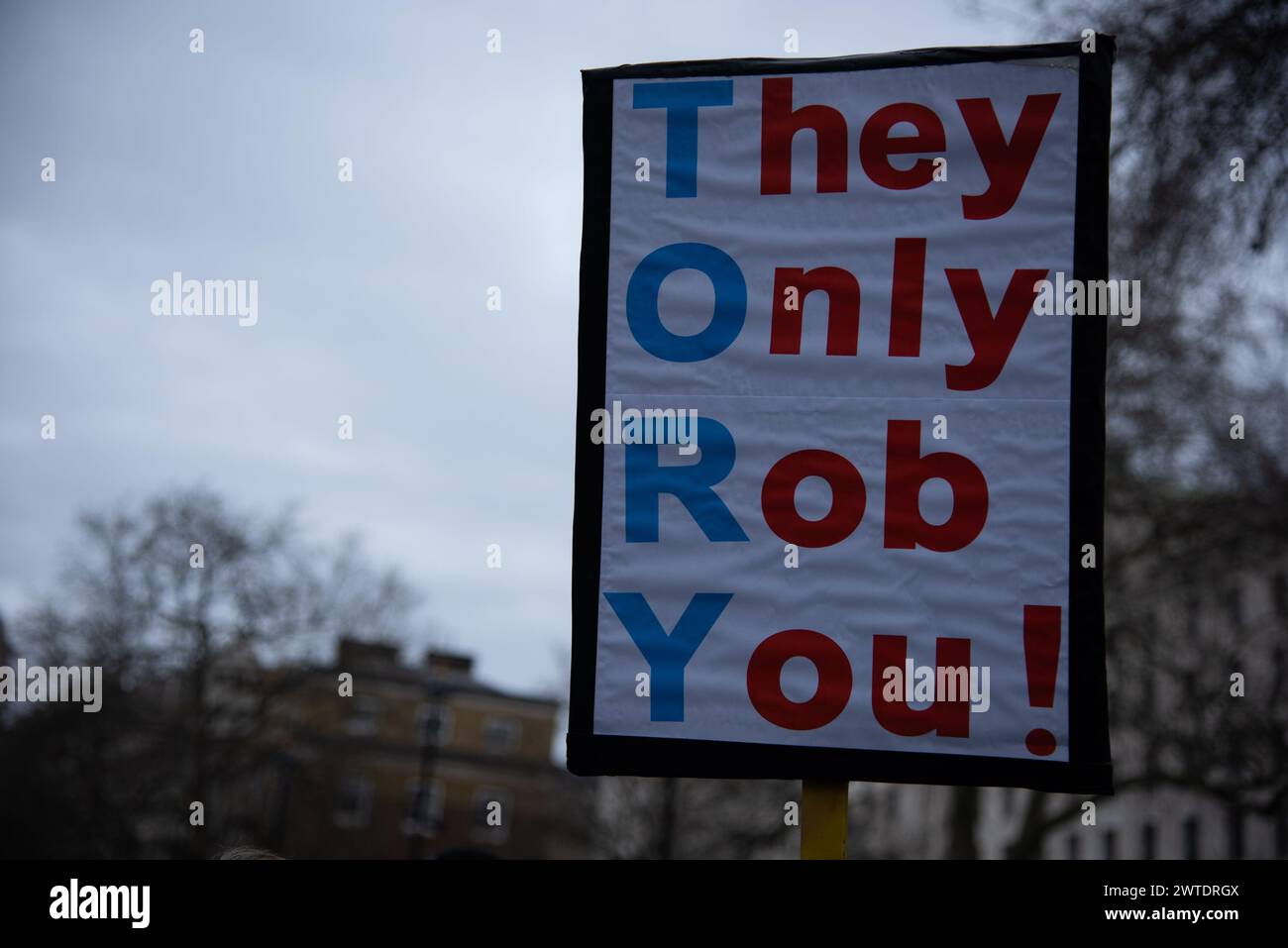 A placard is seen during the UN Anti Racism Day Demonstration. The ...