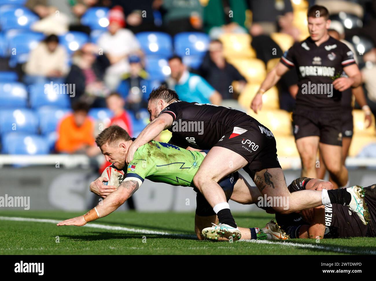 Warrington Wolves' Matt Dufty scores his side's sixth try of the game ...