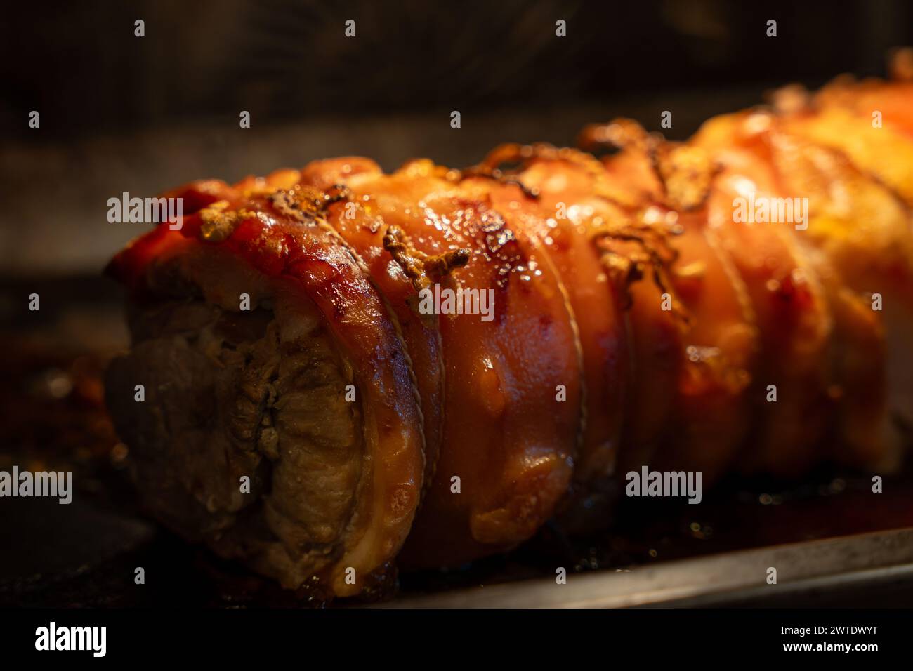 Baked pork wrapped in a roll. Pork roll close-up Stock Photo - Alamy