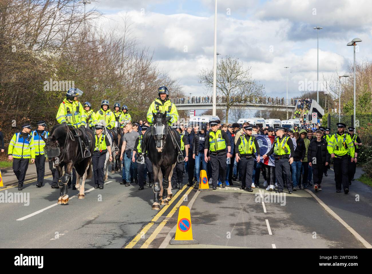 Leeds, UK. 17 MAR, 2024. Millwall fans in Leeds as they march towards ...