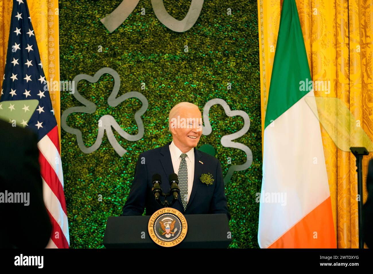 President Joe Biden delivers remarks during a St. Patrick's Day brunch ...