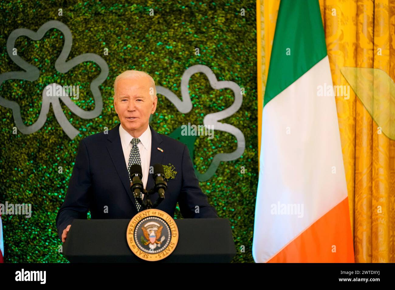 President Joe Biden delivers remarks during a St. Patrick's Day brunch ...