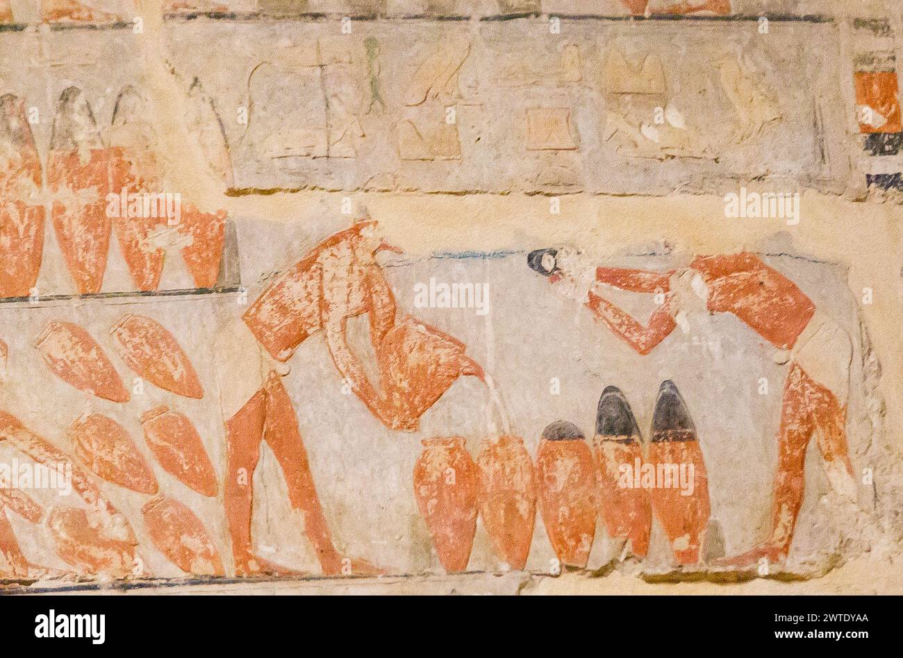 Egypt, Saqqara, tomb of Ty, pouring beer in the jars, and closing the ...