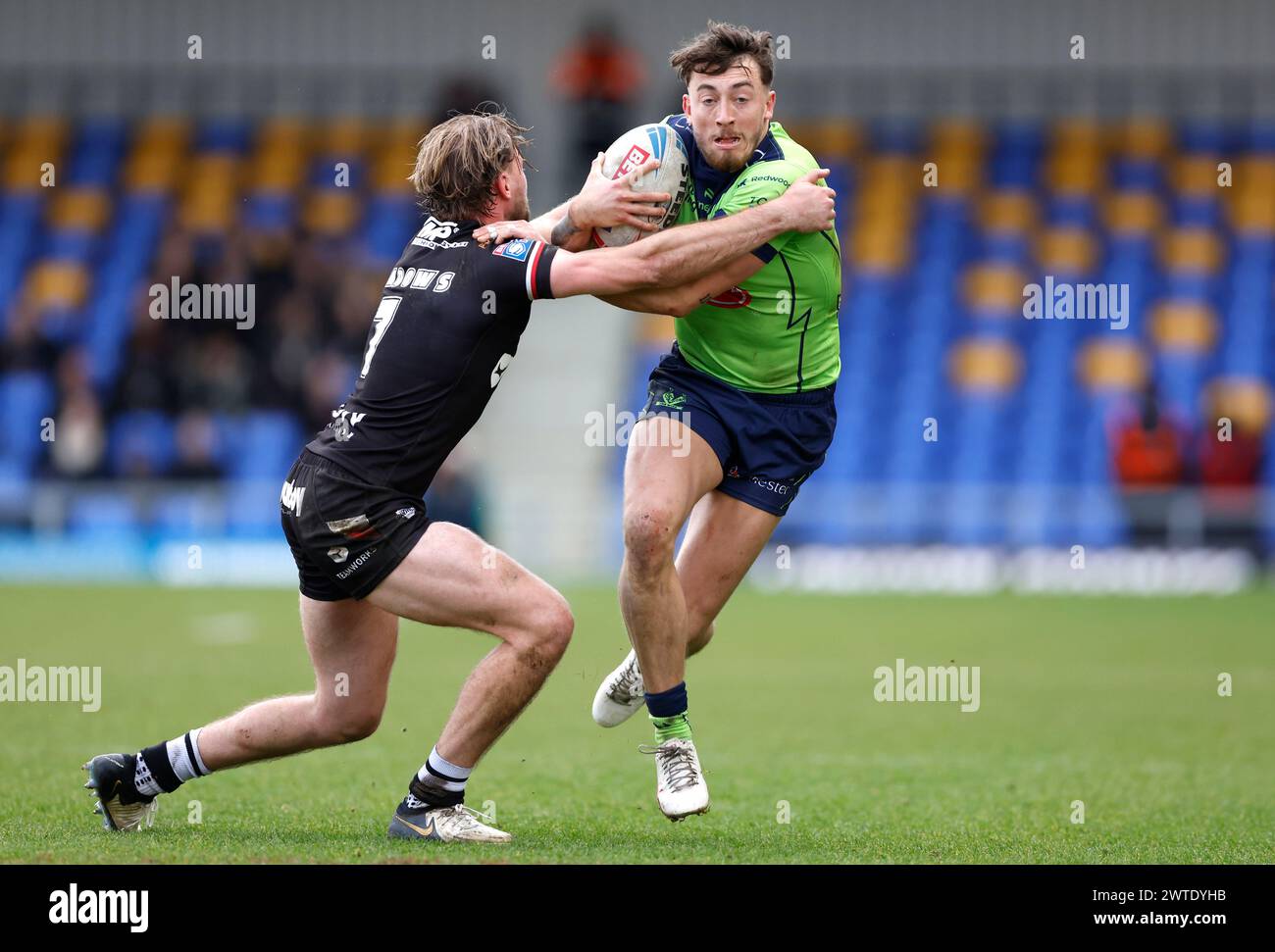 Warrington Wolves' Matty Ashton (right) is tackled by London Broncos ...