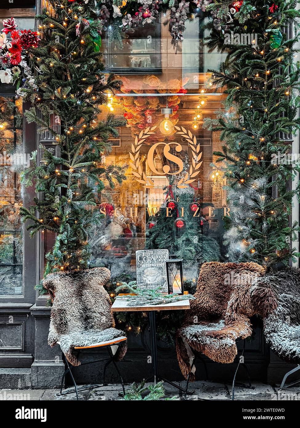 The Christmas decorated exterior of the historic Cafe Schweizer ...