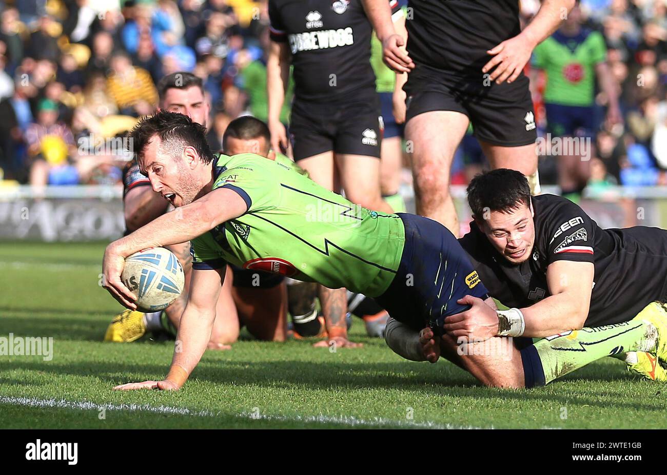 Warrington Wolves' Stefan Ratchford scores his side's tenth try of the ...