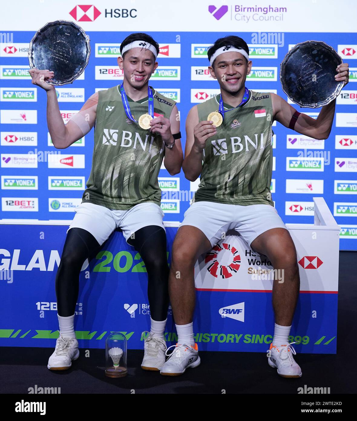 Indonesia's Muhammad Ardianto pose with their trophies following ...