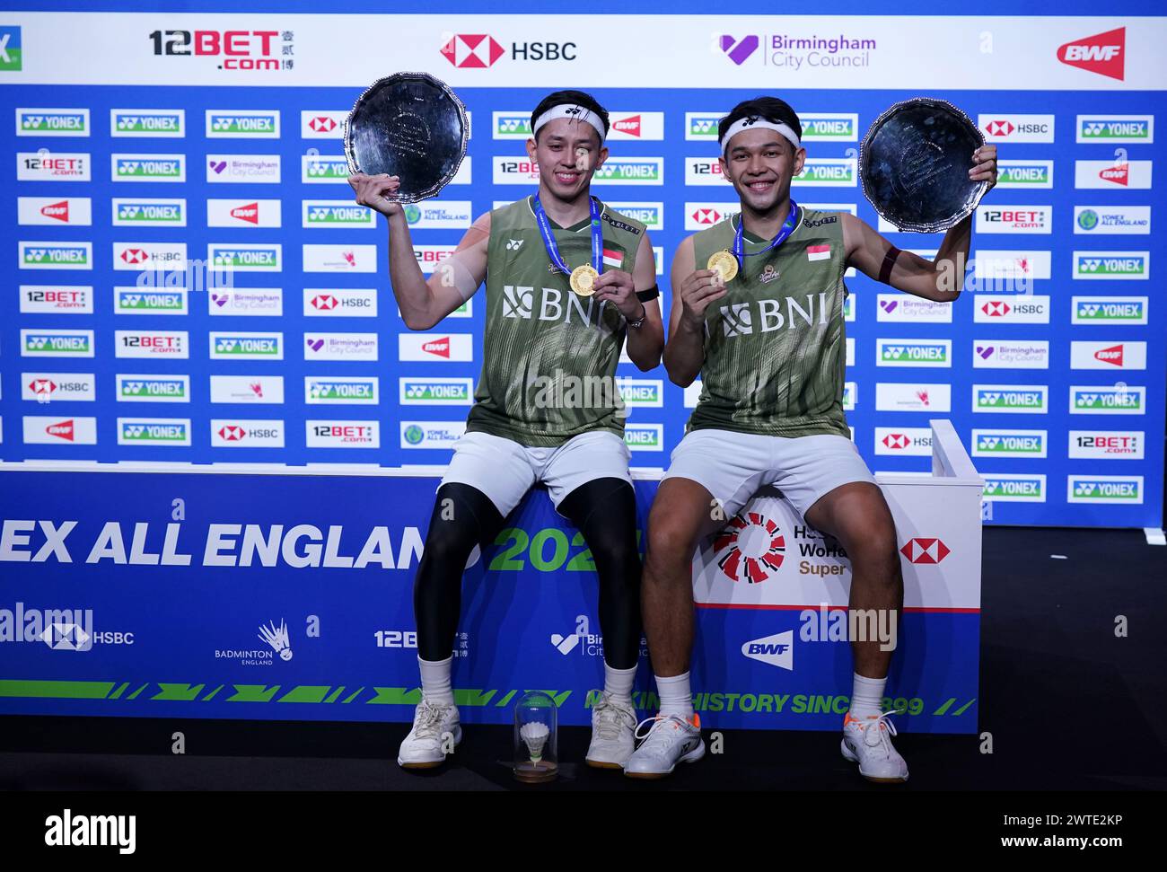 Indonesia's Muhammad Ardianto pose with their trophies following ...
