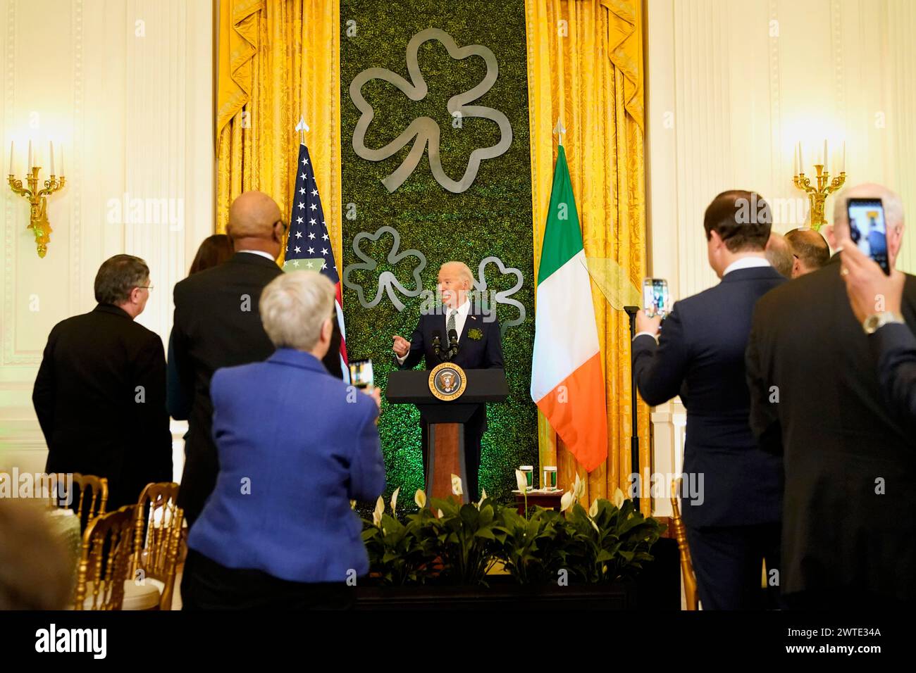 President Joe Biden delivers remarks during a St. Patrick's Day brunch ...