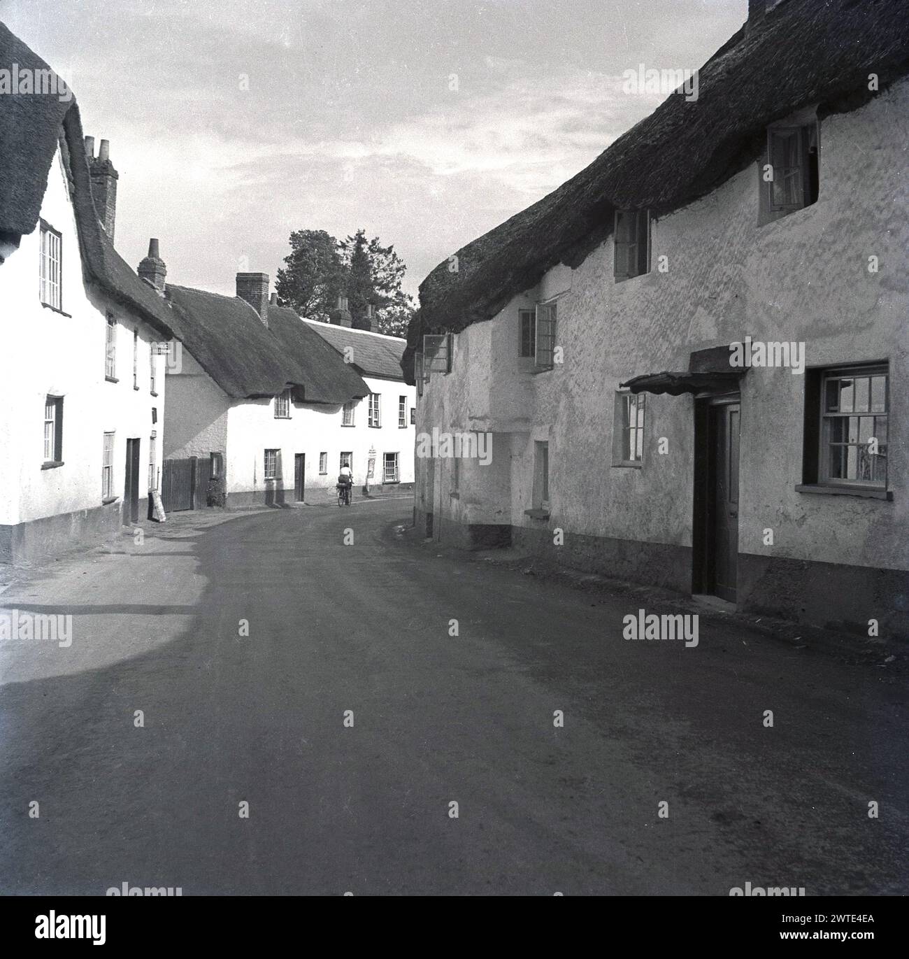 1950s, historical, English village high street in Devon, show ...