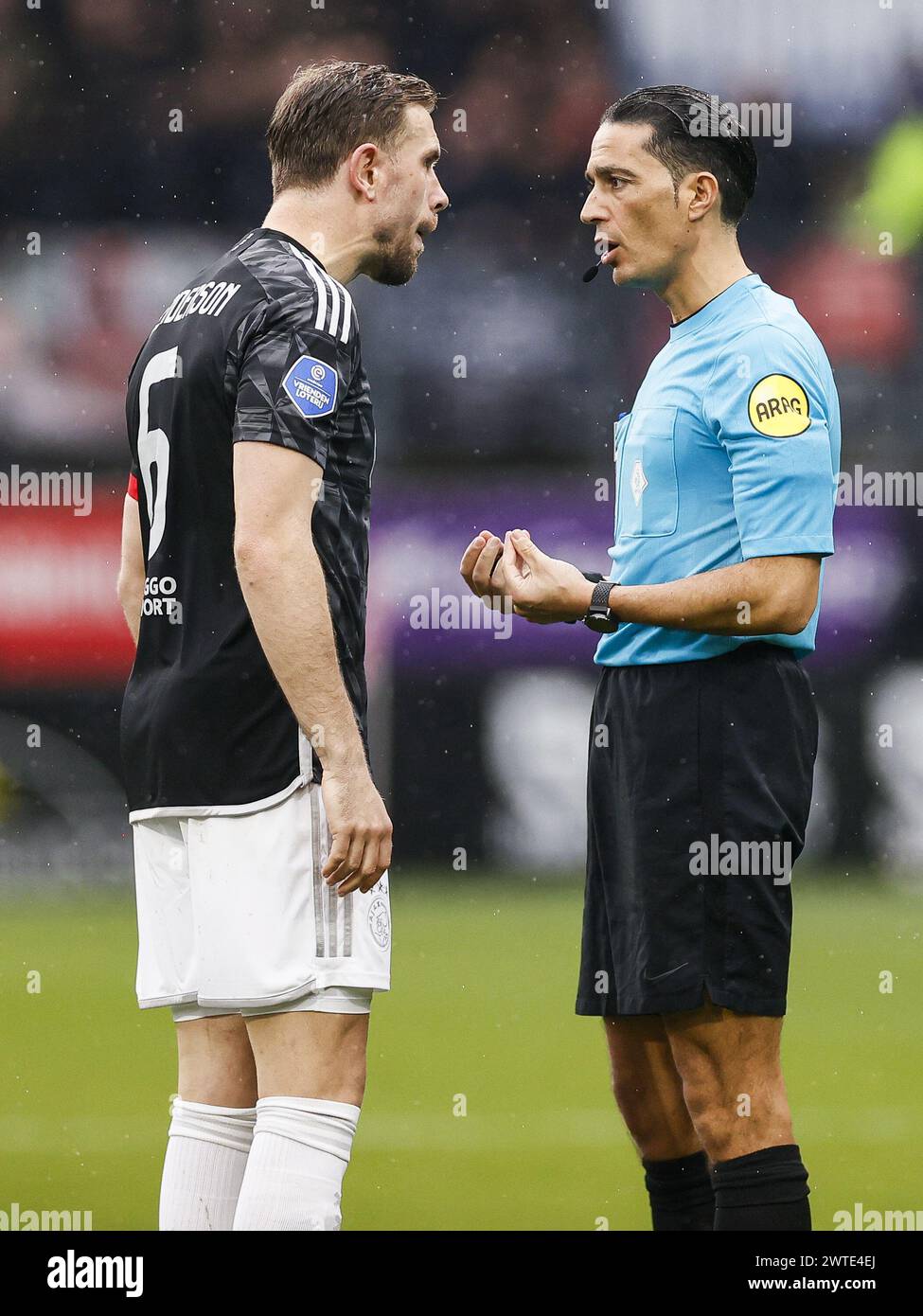 ROTTERDAM - (l-r) Jordan Henderson of Ajax, Referee Serdar Gozubuyuk ...