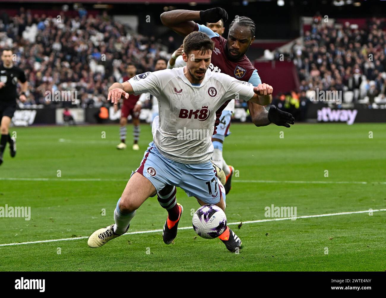 London, UK. 17th Mar, 2024. Clément Lenglet (Aston Villa) falls under ...