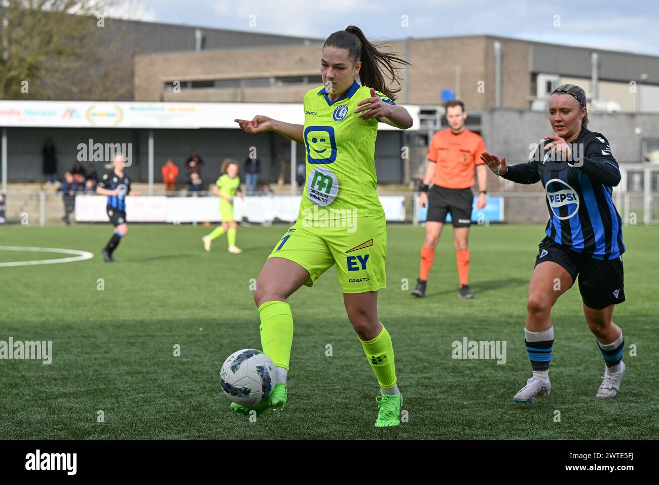 Aalter, Belgium. 16th Mar, 2024. Elfi Maass (21) of AA Gent and Fleur Pauwels (17) of Club YLA ...