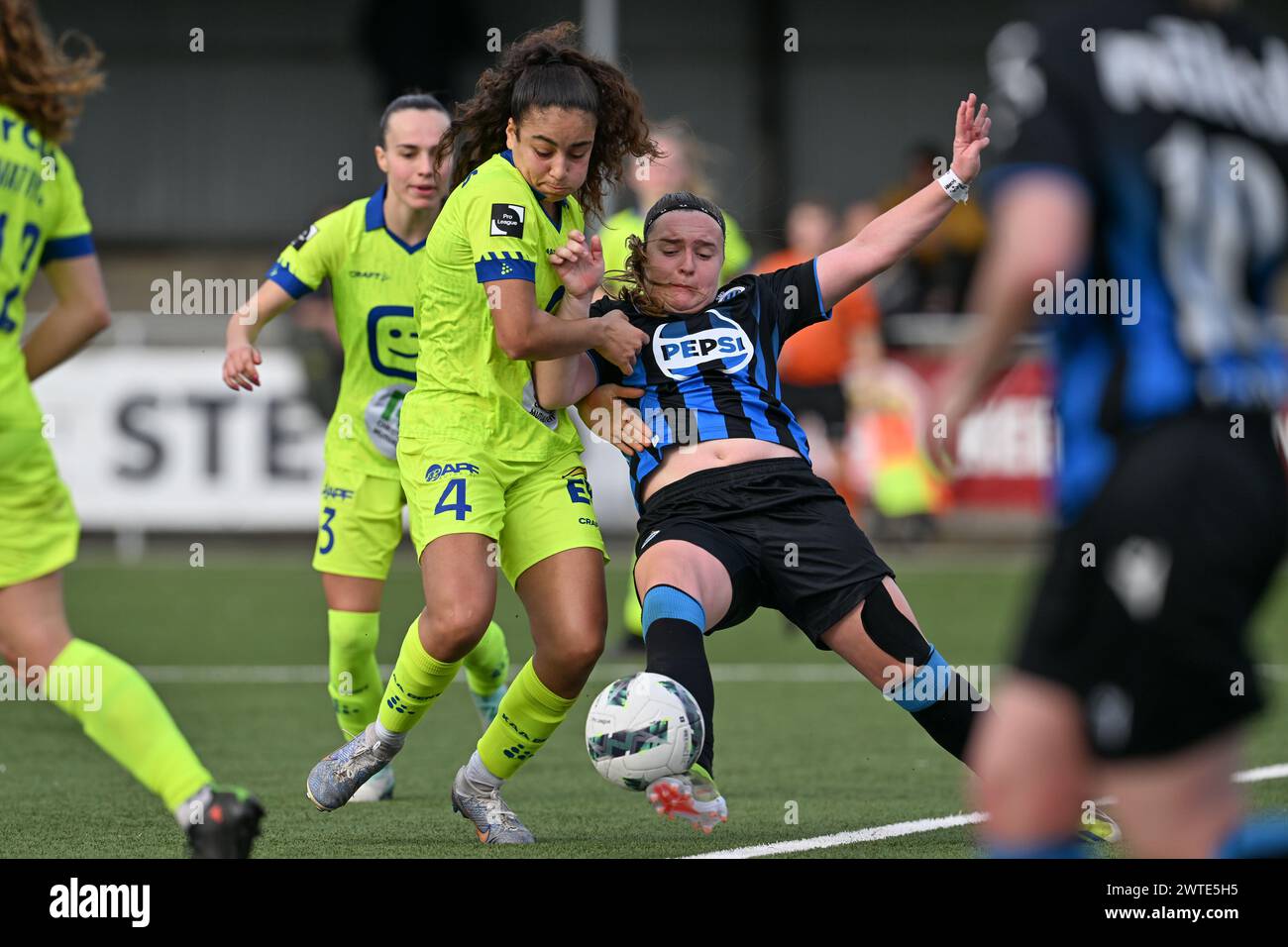 Aalter, Belgium. 16th Mar, 2024. Nia Elyn (4) of AA Gent pictured defending on Davinia ...