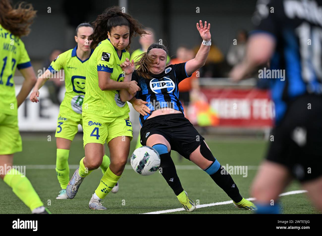 Aalter, Belgium. 16th Mar, 2024. Nia Elyn (4) of AA Gent pictured defending on Davinia ...